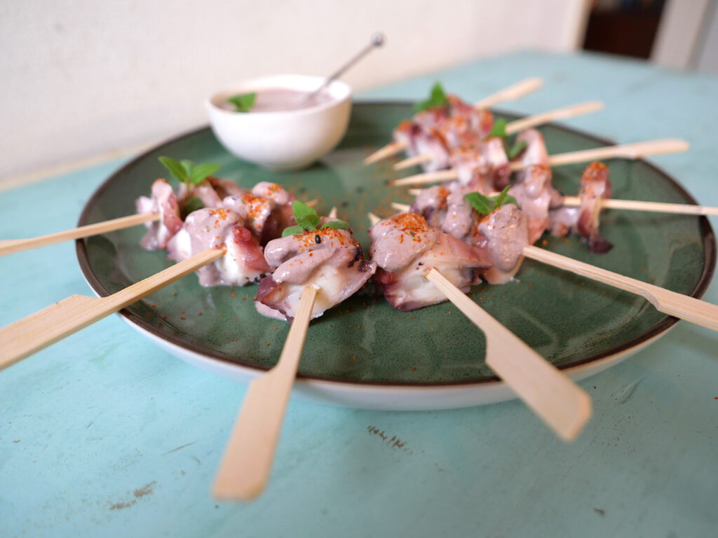 Peruaanse pulpo al olivo (geroosterde pulpo met olijvensaus) - Culy